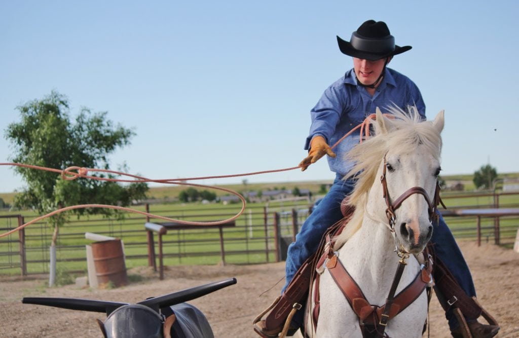 Lewistown cowboy with Down syndrome excelling as a team roper